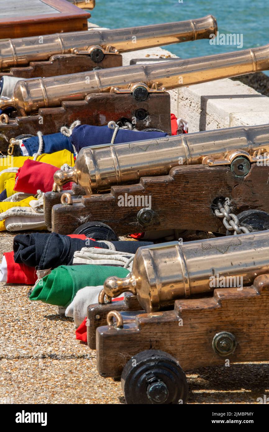 starting canons and colourful signal flags at the royal yacht squadron ...