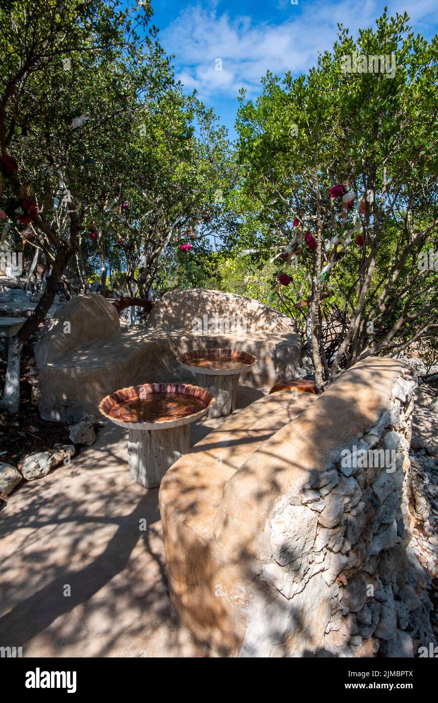 terrace dappled in sunlight at a taverna on the greek island of zante ...