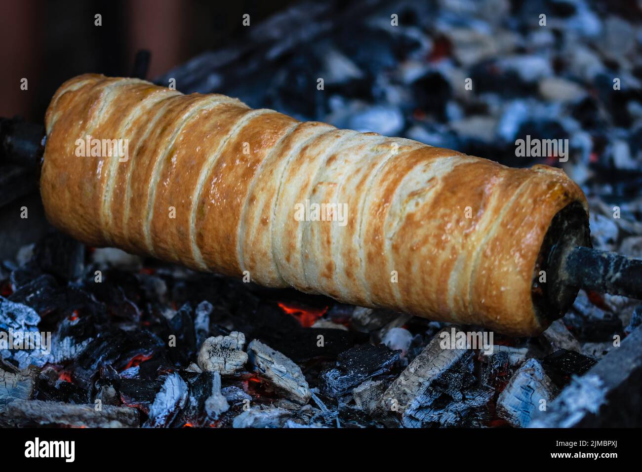 Kurtos Kolacs (Kürtőskalács). Traditional Hungarian cake, baked with ...
