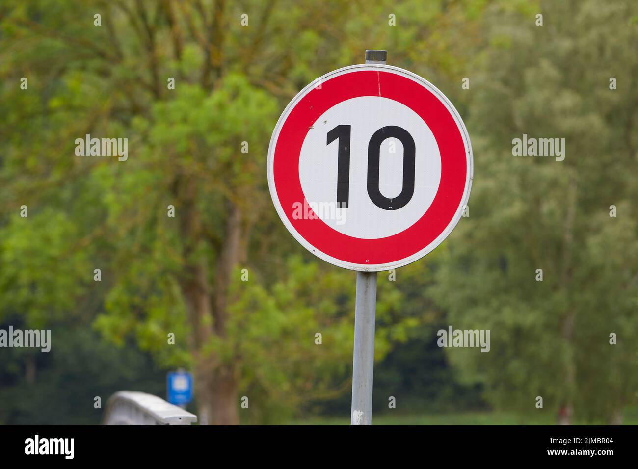 speed limit sign showing ten (10) km/h Stock Photo - Alamy