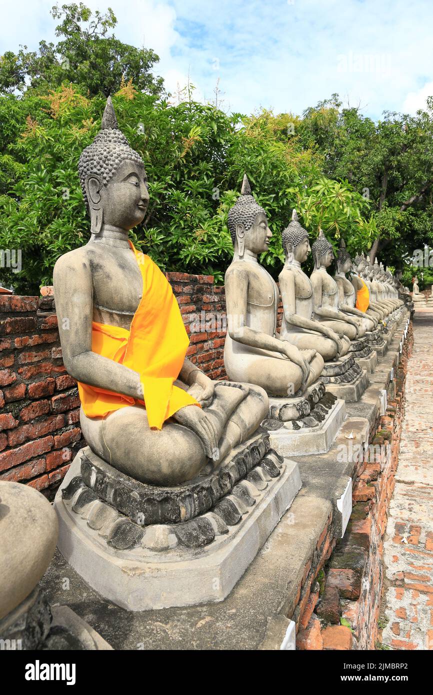 Row of ancient buddha statue in ancient temple Thailand Stock Photo - Alamy