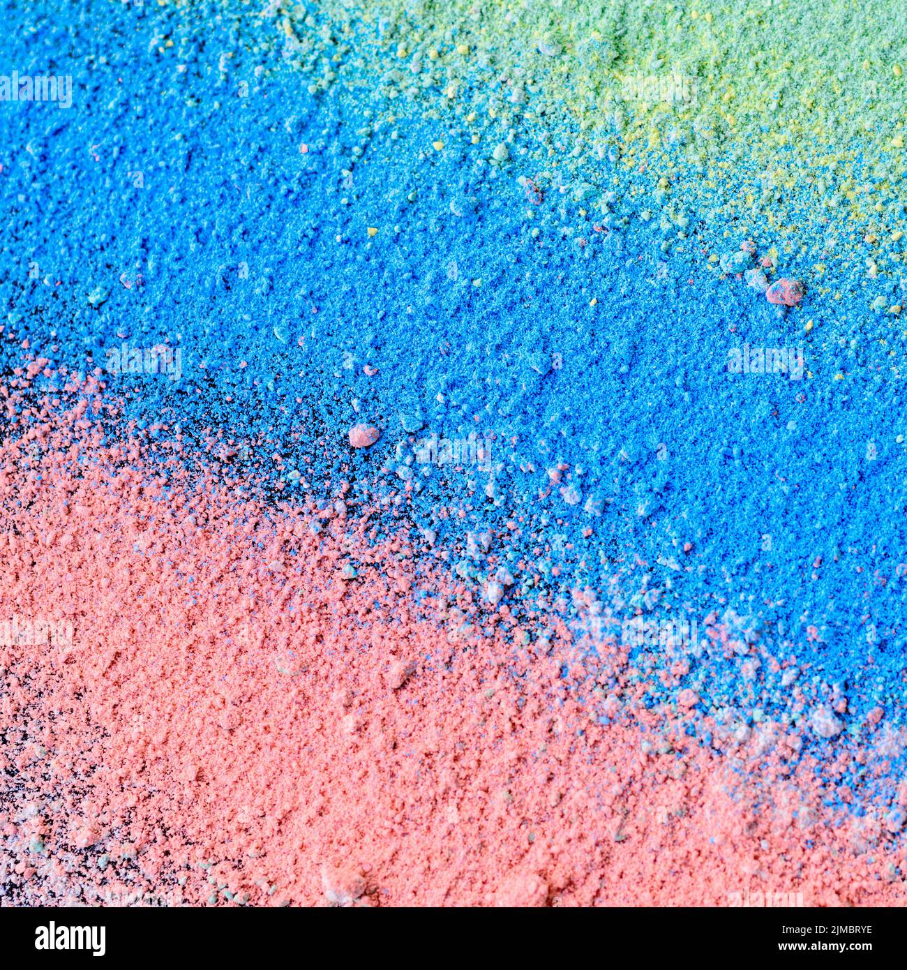 Colorful background of chalk powder. Multicolored dust particles ...