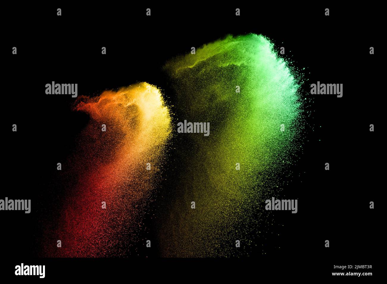 Launched colorful powder on black background.Color powder explosion ...