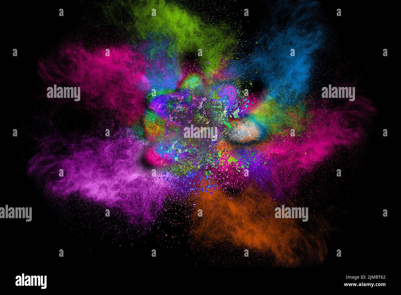 Launched colorful powder on black background.Color powder explosion ...