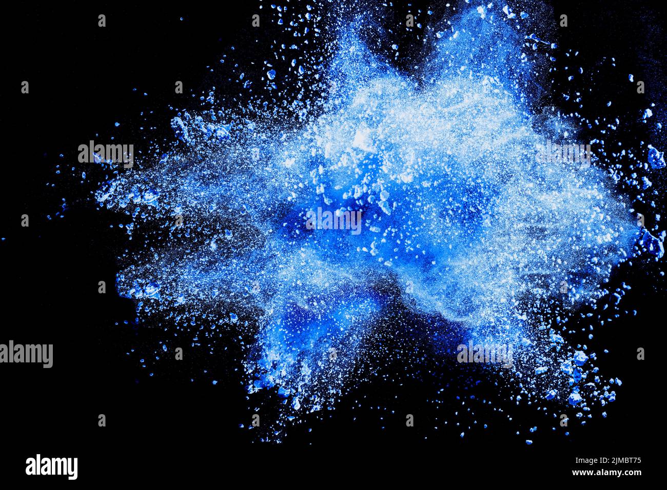 Blue powder explosion on black background Stock Photo - Alamy