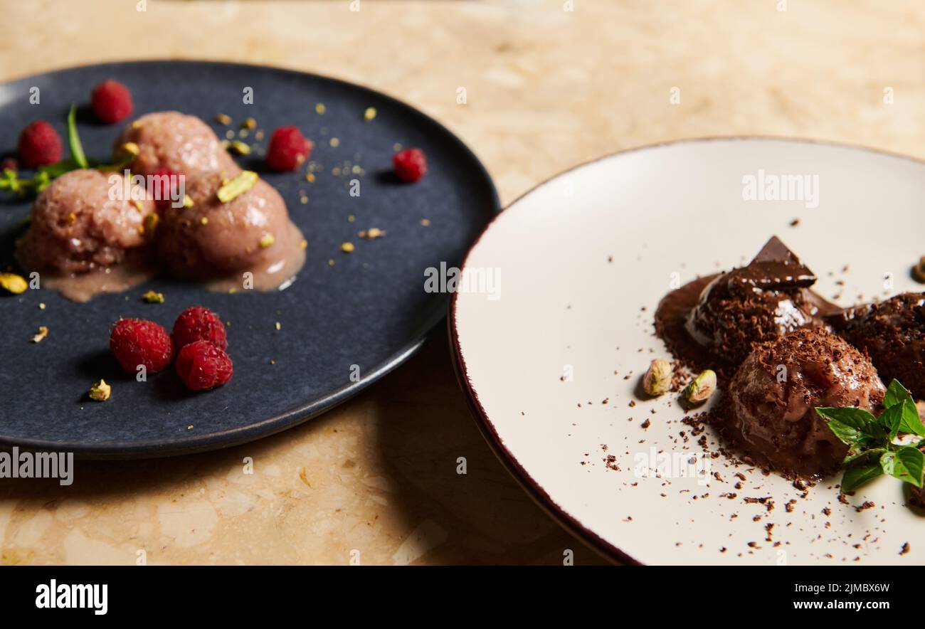 Selective focus on refreshing rew vegan sorbets, melting on serving ...