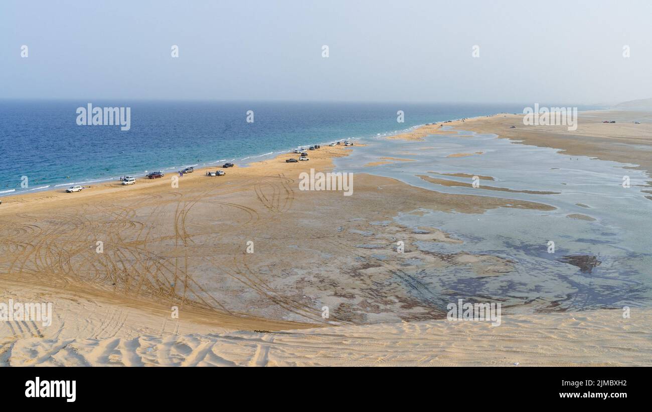 qatar adventurous place khor al udeid ,sea line beach Stock Photo - Alamy