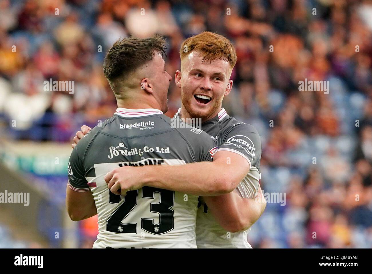 Connor Wynne #23 of Hull FC celebrates with Ellis Longstaff #38 of Hull ...