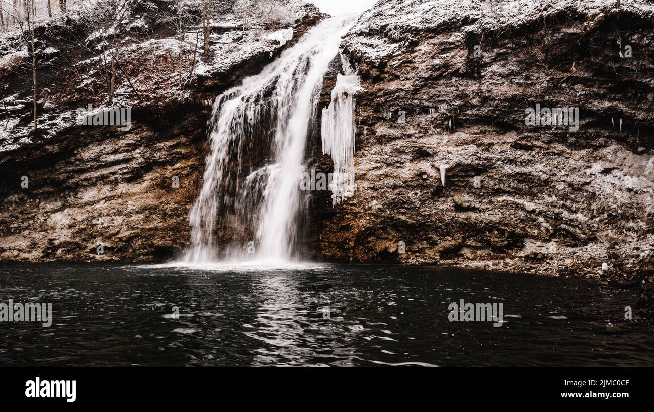 Small waterfall pouring lake hi-res stock photography and images - Alamy