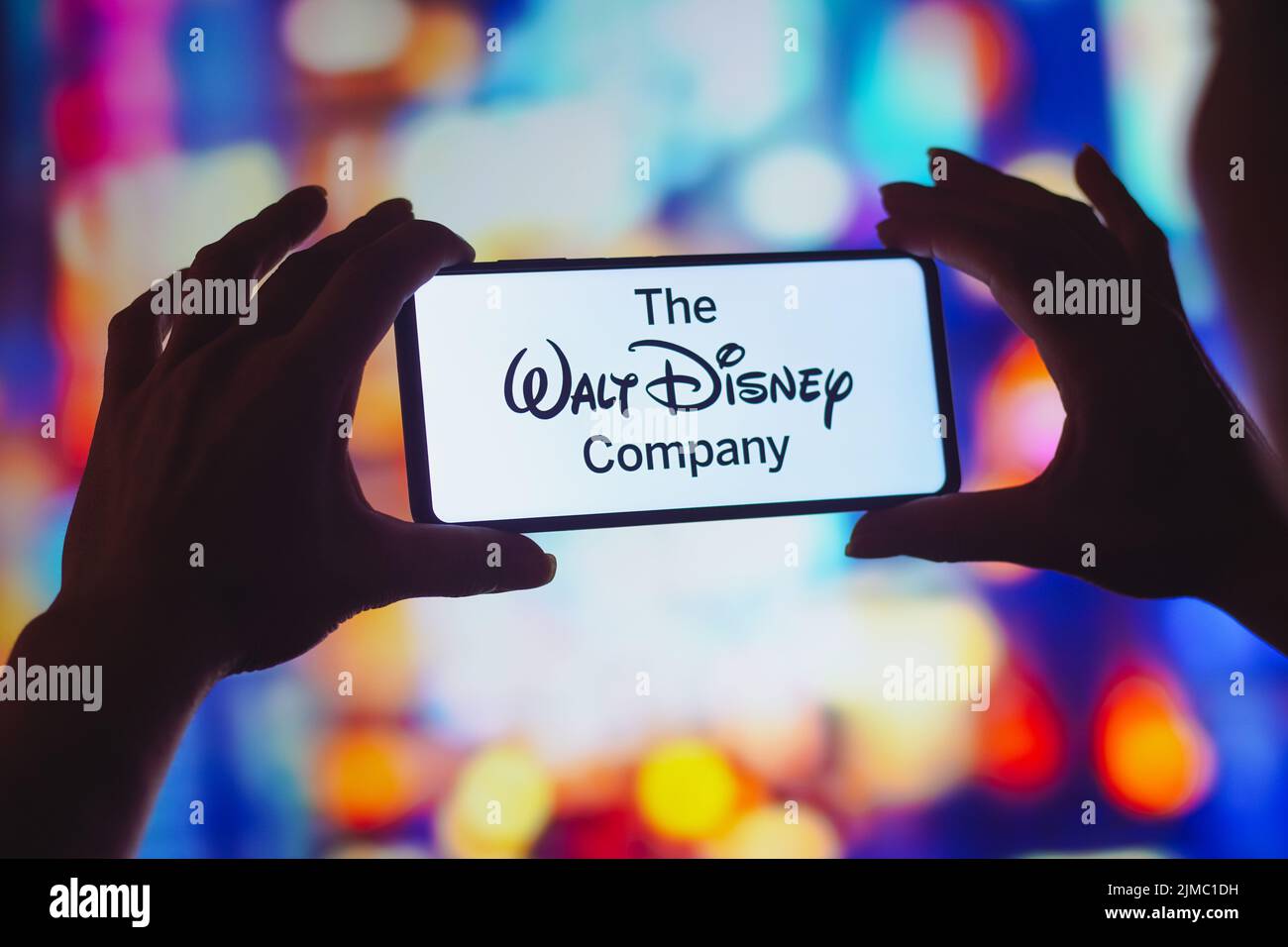 In this photo illustration, the Walt Disney Company logo is displayed ...