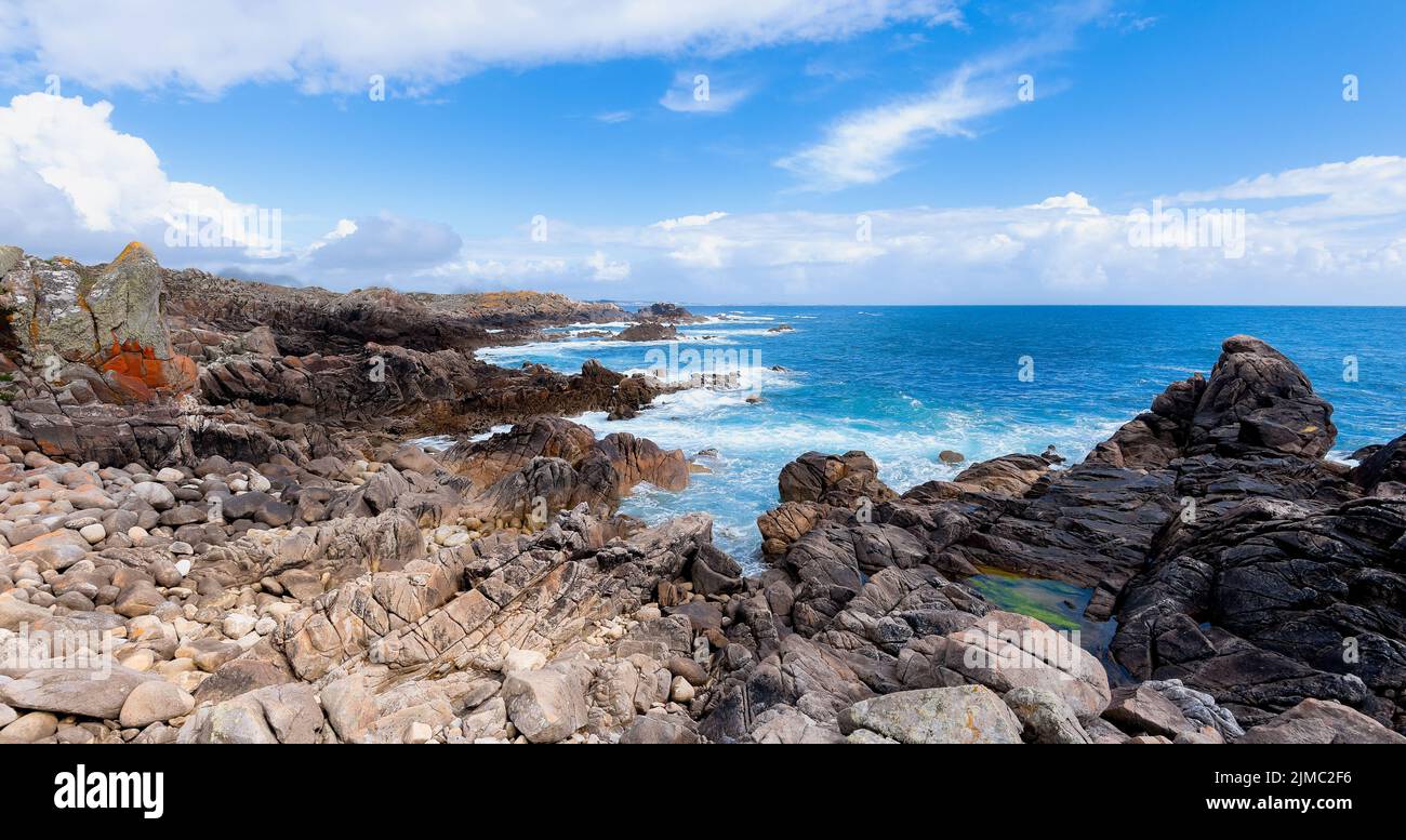 Landscape of sea, cliff blue sky with clouds. Ocean coast in the north ...