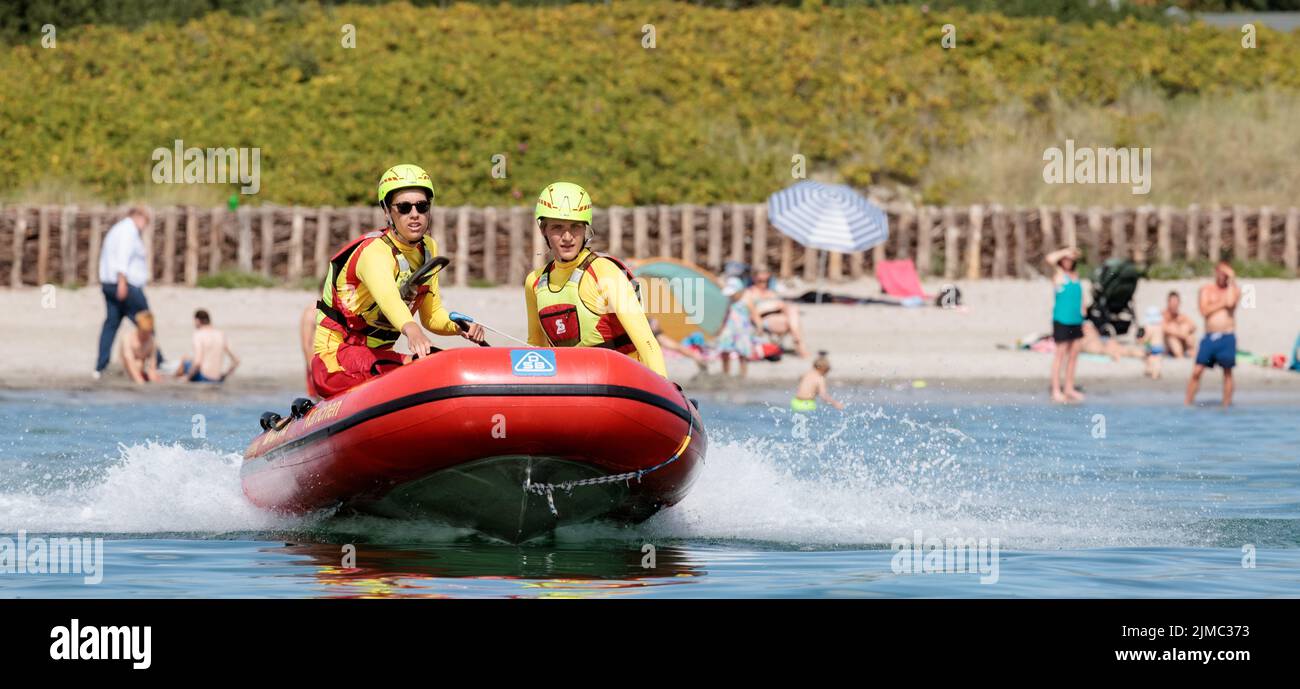 Damp, Germany. 04th Aug, 2022. Two water rescuers of the German Life ...