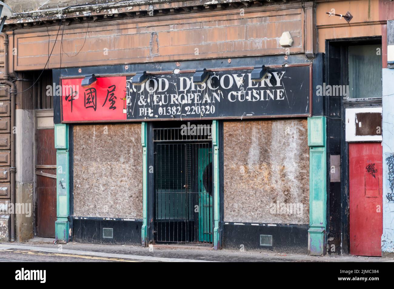 Boarded up former Chinese restaurant in Dundee Stock Photo - Alamy
