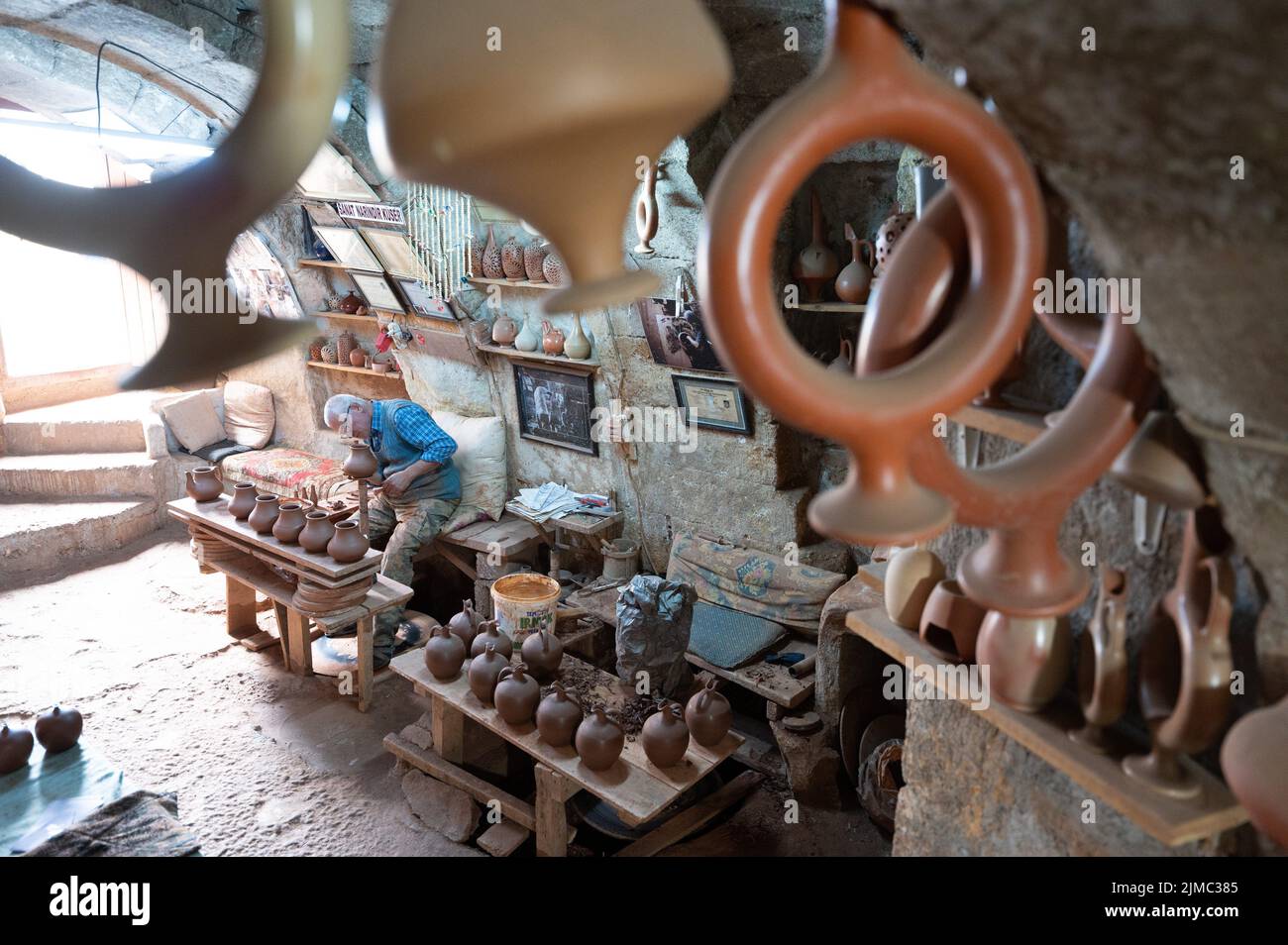 Avanos, Turkey. 29th June, 2022. Potter Mehmet Körükcü sits at a potter ...