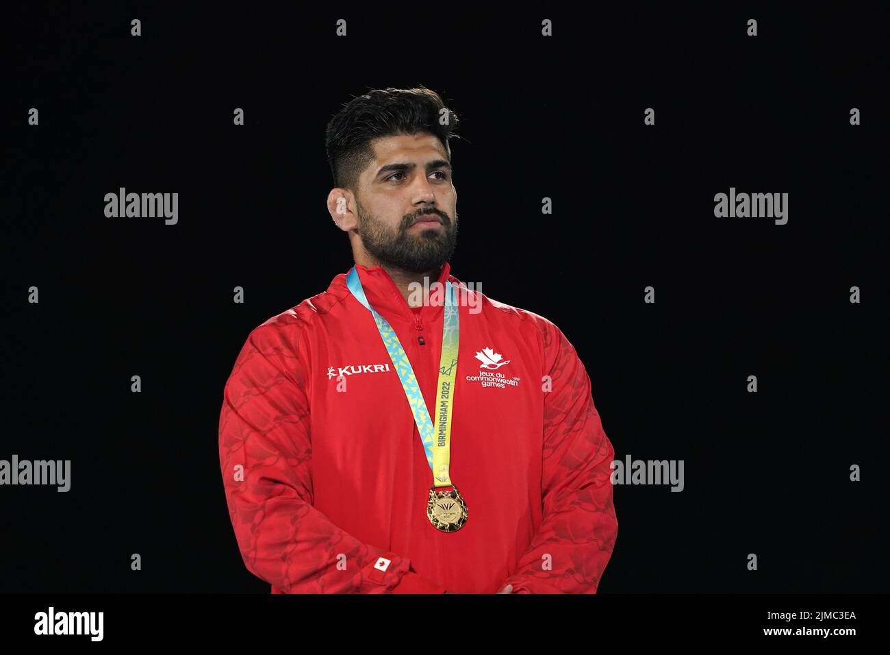 Canada's Amarveer Dhesi poses with his gold medal after his Men's ...
