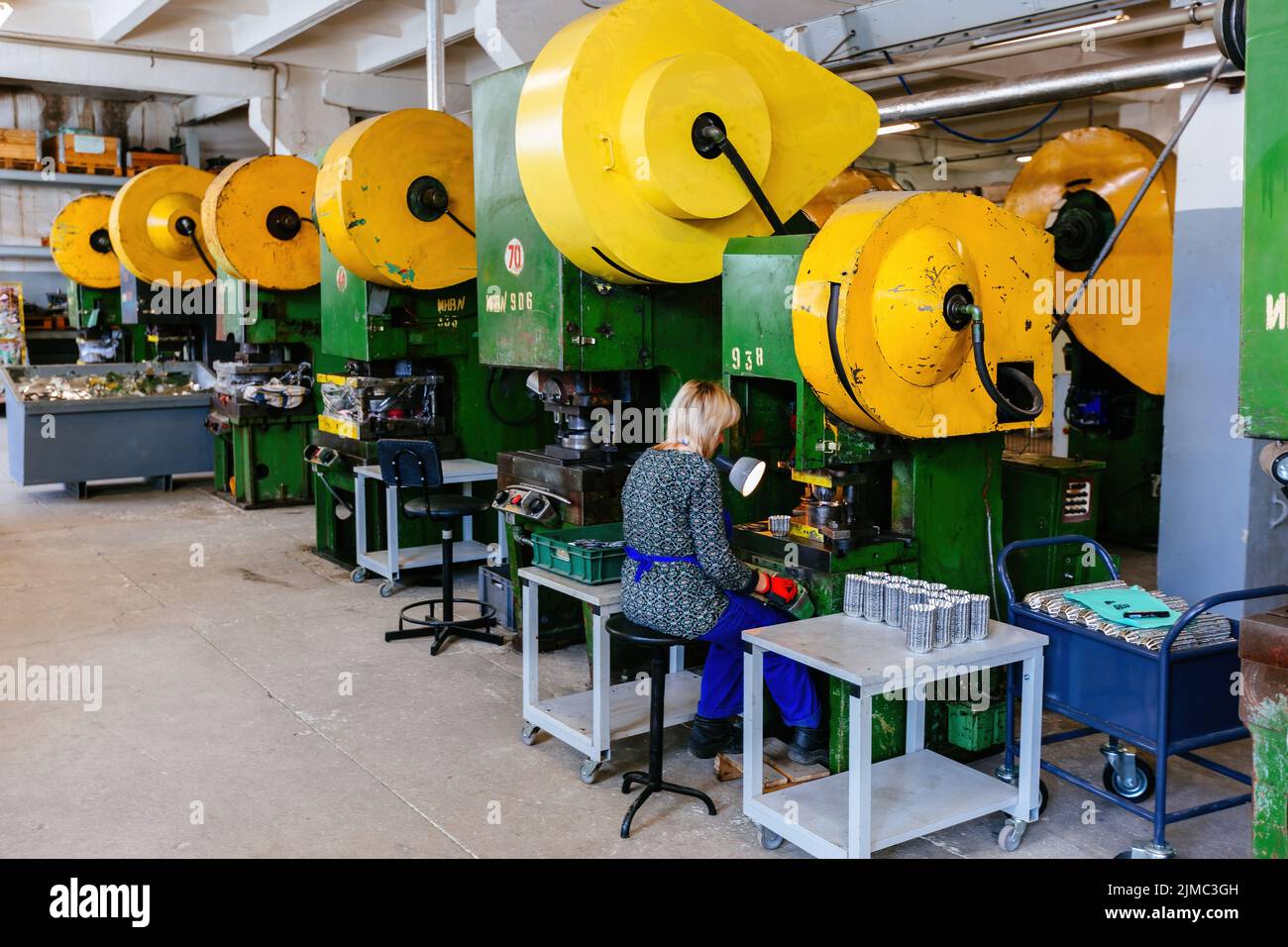 Metal press form stamping machines in workshop Stock Photo - Alamy