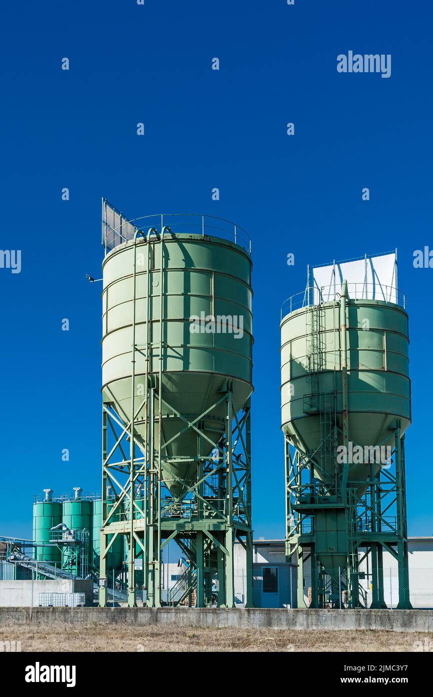 Two silos for lime Stock Photo - Alamy