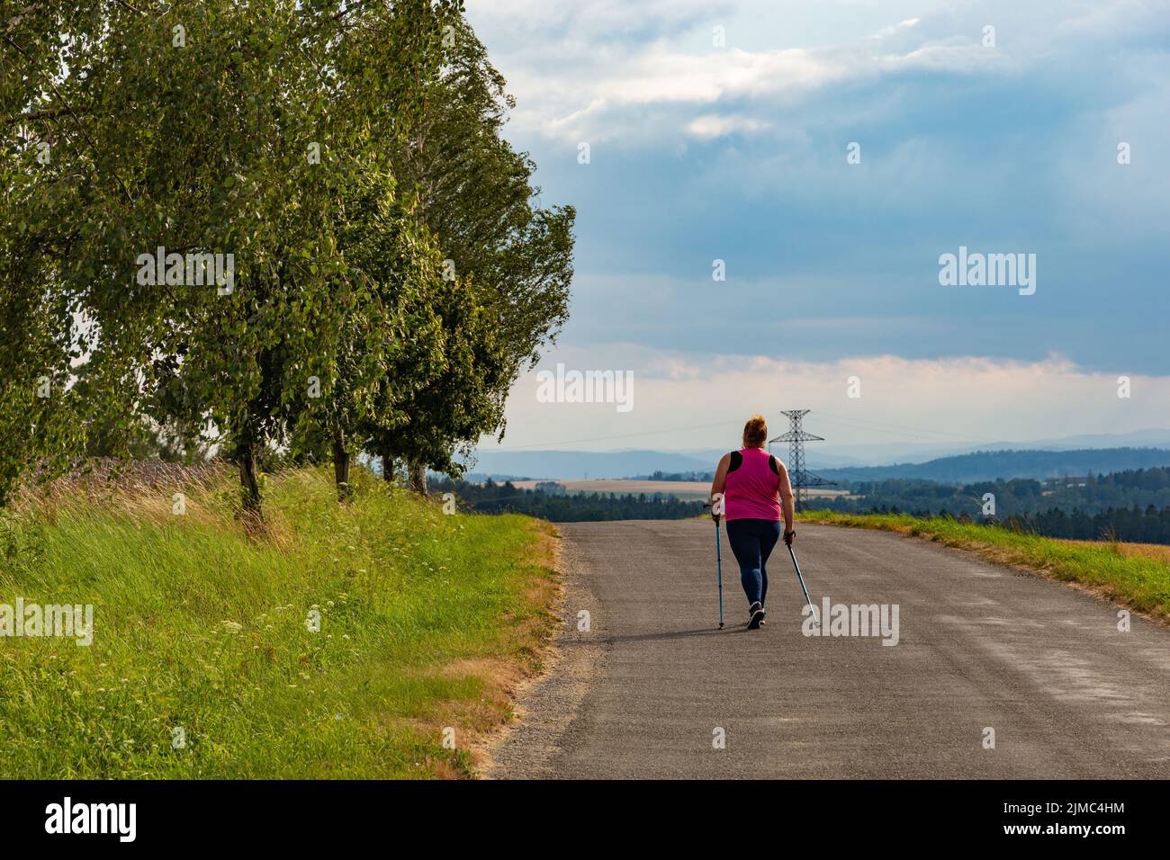 Nordic walking - active woman outdoors Stock Photo - Alamy