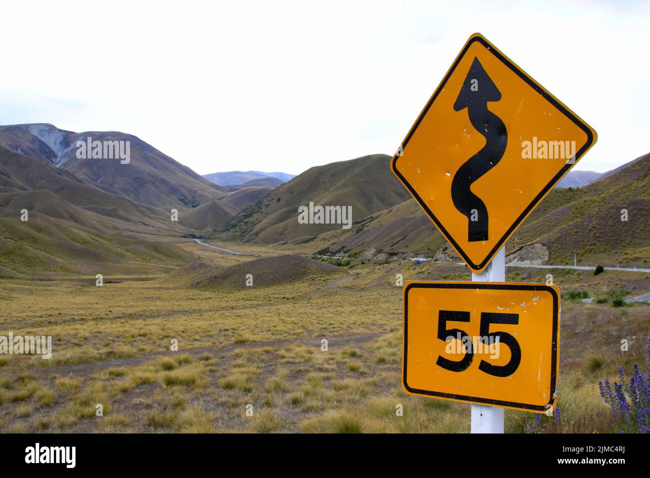Road sign Curve Stock Photo - Alamy