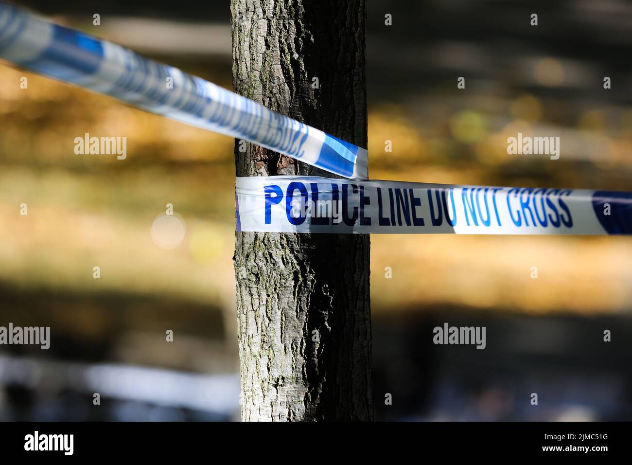 Police tapes around a crime scene Stock Photo - Alamy