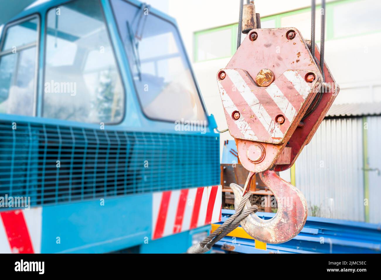Crane hook with steel cable Stock Photo - Alamy