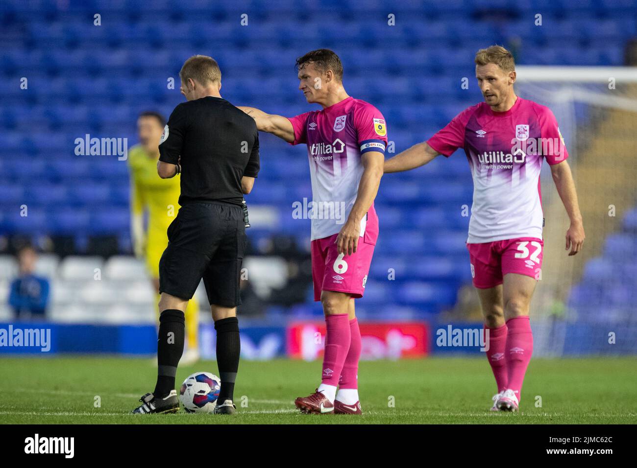 Jonathan Hogg #6 of Huddersfield Town argues with Referee Gavin Ward ...