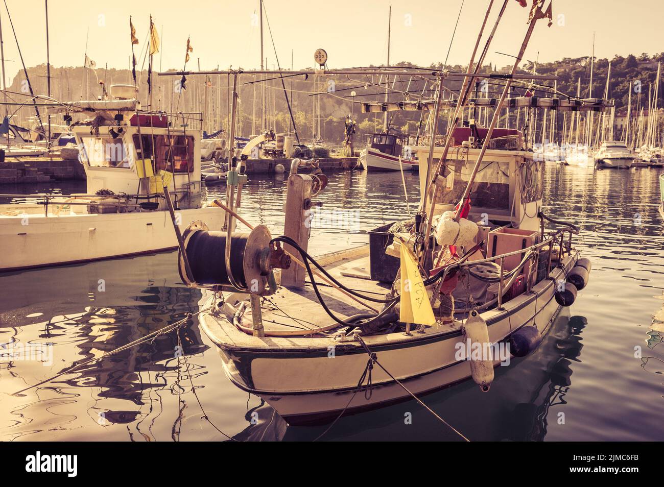 Fishing boats in harbor Stock Photo - Alamy