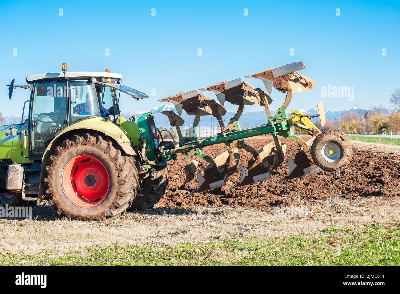 Tractor plowing hi-res stock photography and images - Alamy
