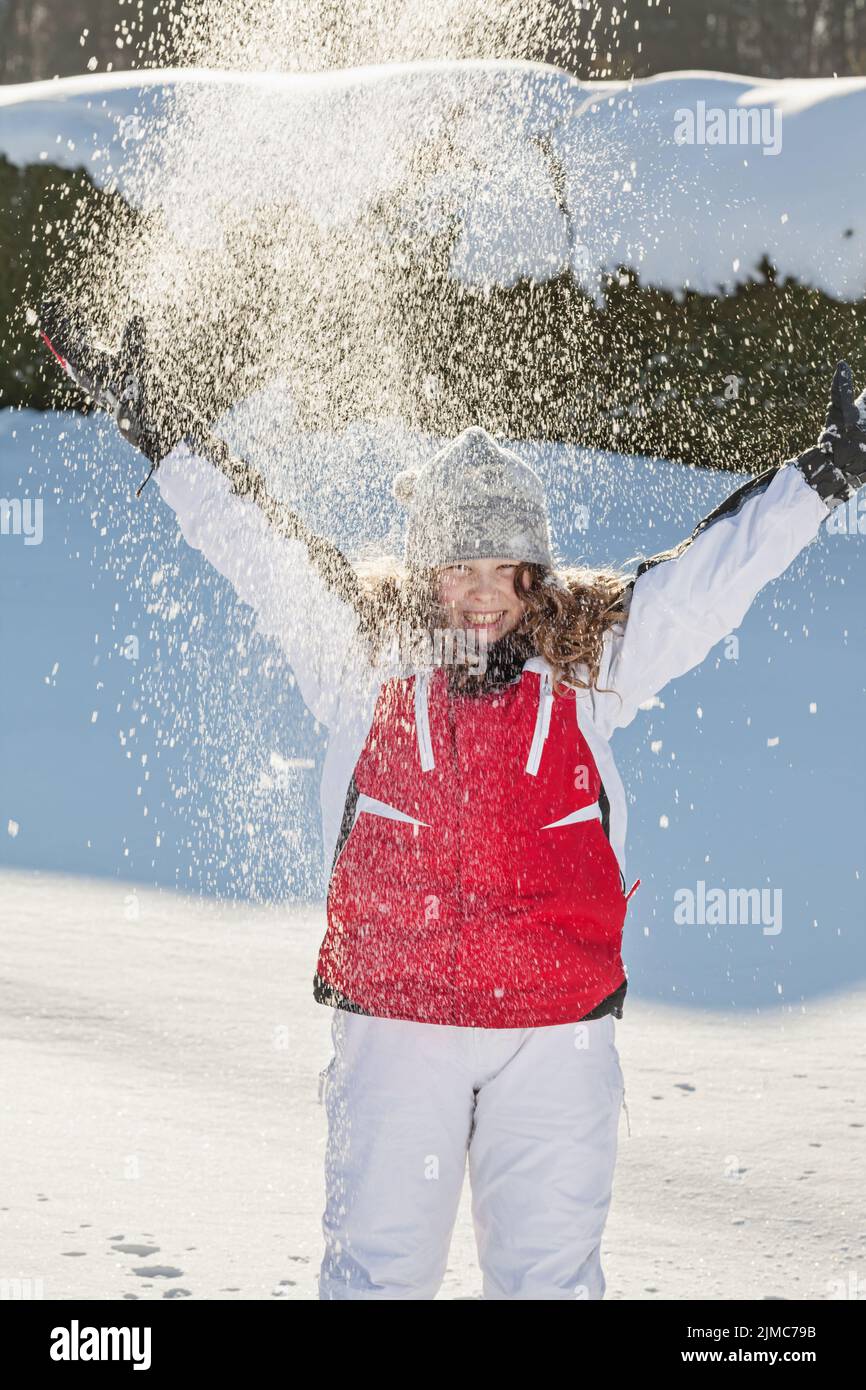 Teenager playing in snow hi-res stock photography and images - Alamy