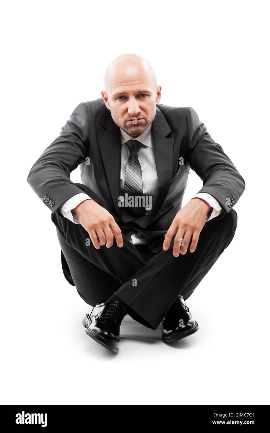 Tired or stressed businessman in depression sitting floor white ...
