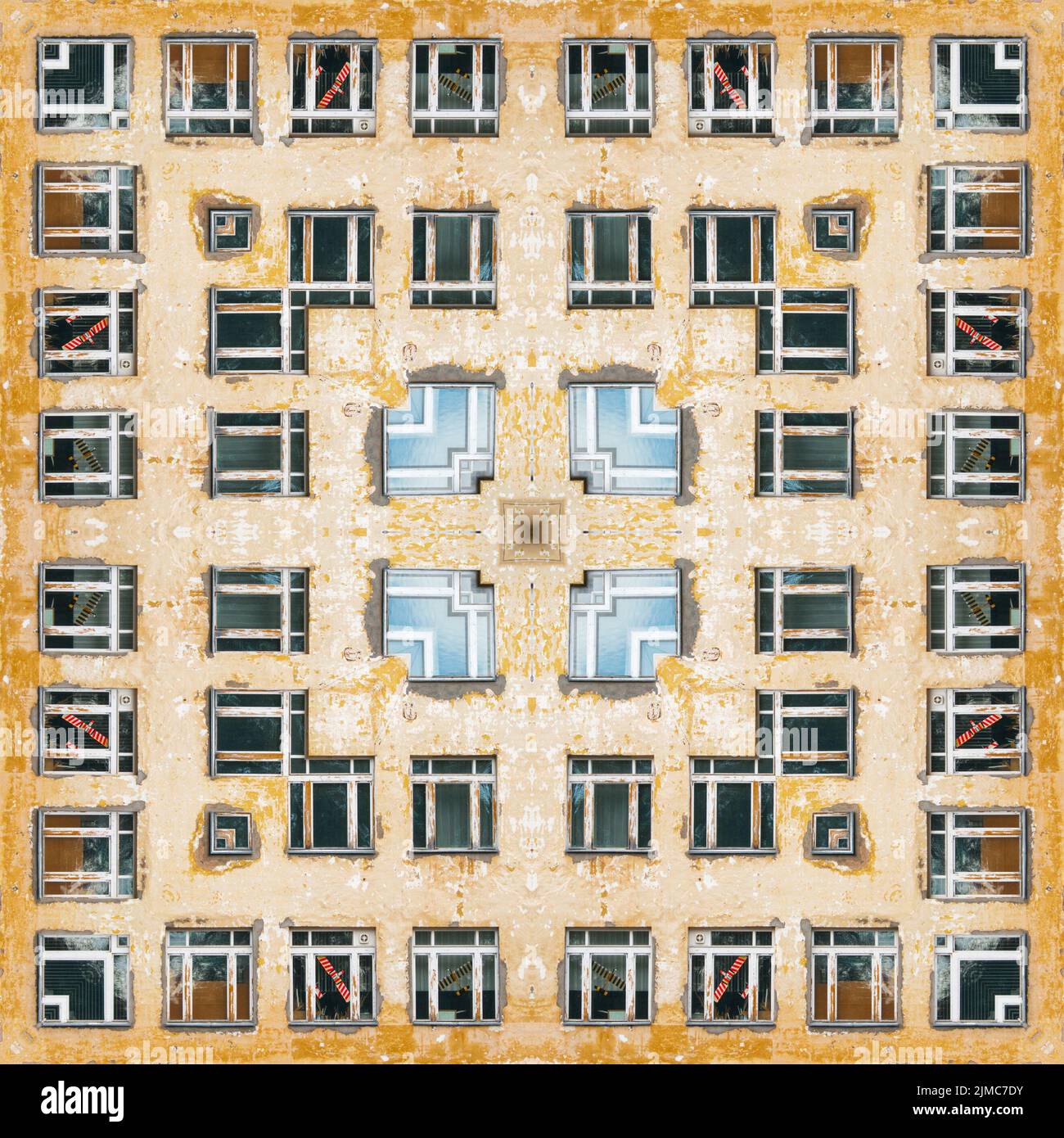 The windows on the old yellow wall with collapsed plaster - a pattern ...