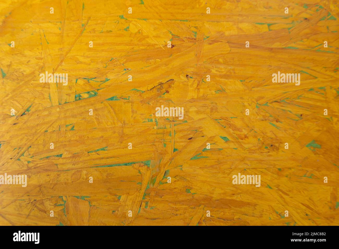 wallpaper of a rustic yellow wood surface, colorful abstract design ...