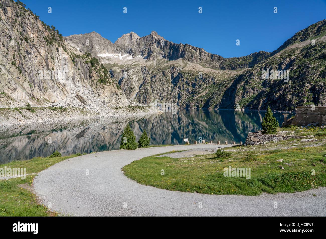 drive way at the Barrage dam and Lac de Cap-de-Long reservoir high ...