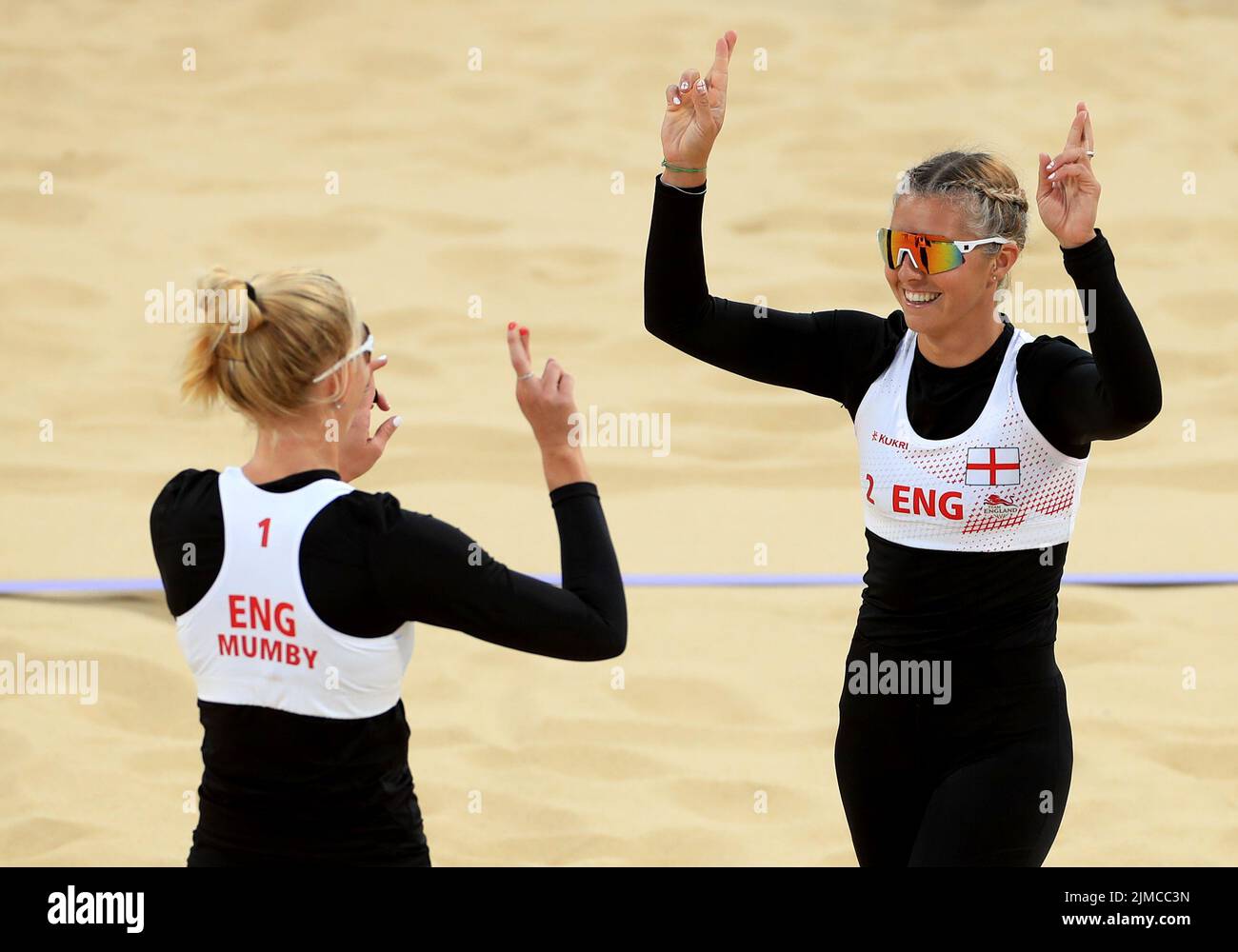 England’s Daisy Mumby and Jessica Grimson celebrate a point during the ...