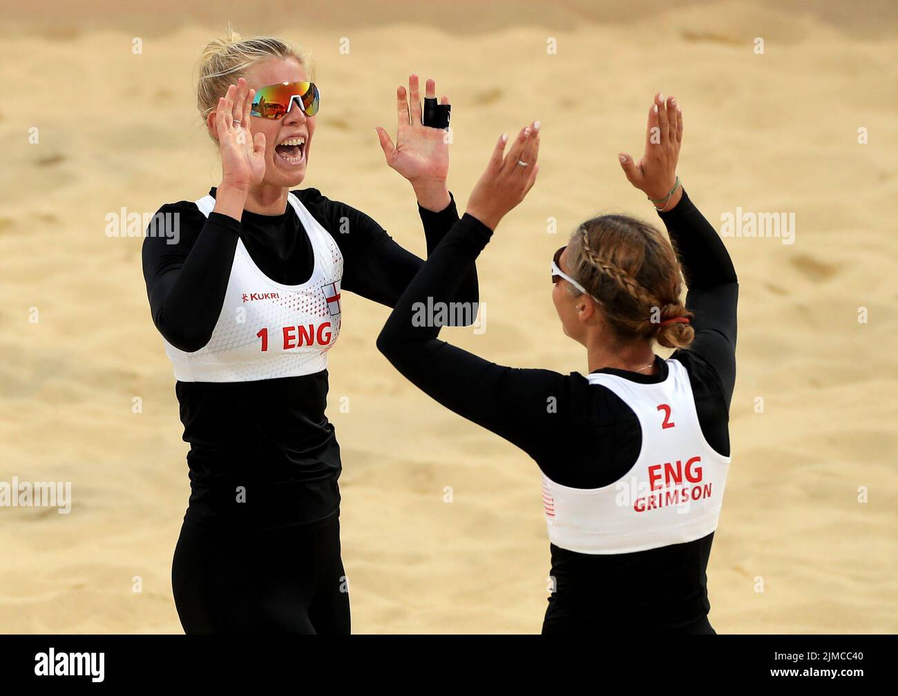 England’s Daisy Mumby and Jessica Grimson celebrate a point during the ...
