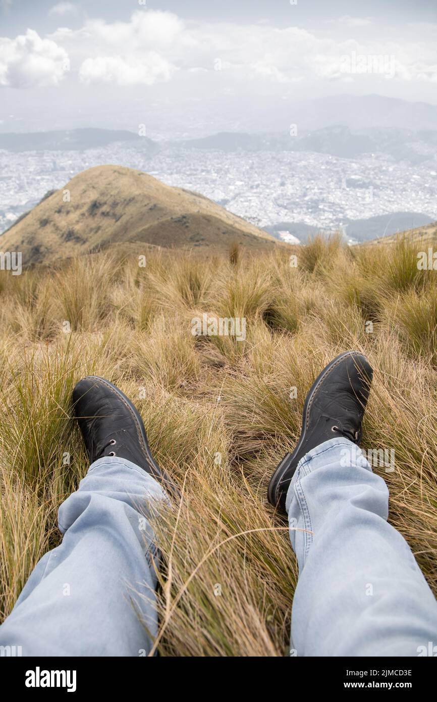 scene of a legs and shoes of a relaxed tourist in the background ...