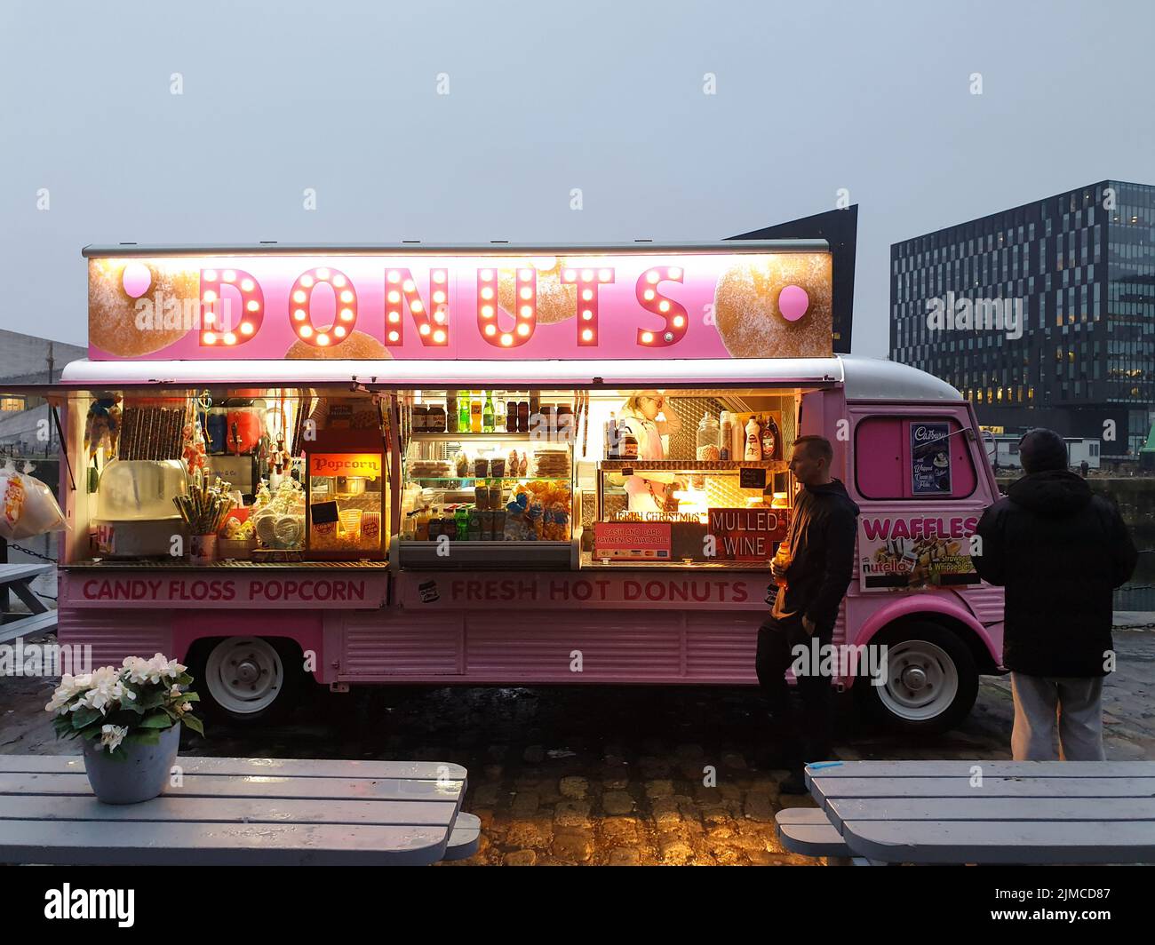 Pink food truck offering donuts and waffles at the Albert Dock ...