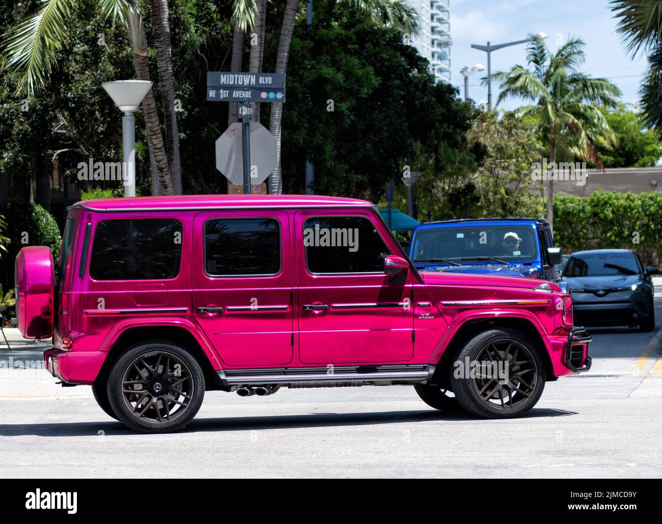 Miami Beach, Florida USA - April 15, 2021: pink metallic mercedes benz ...