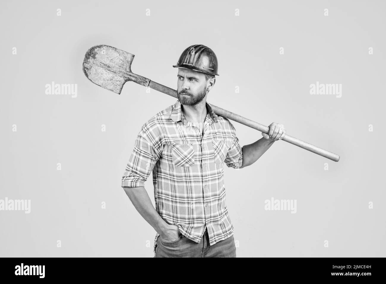 Confident worker. mature builder in shirt. unshaven man on construction ...