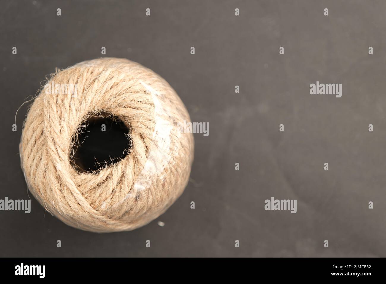 Roll of Thread on dark background with space for put the text Stock ...
