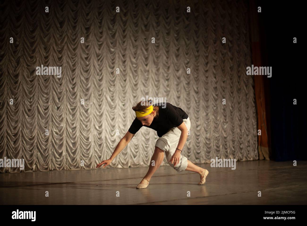 Dancer on stage. Ballet teacher. Expression of emotions in motion ...