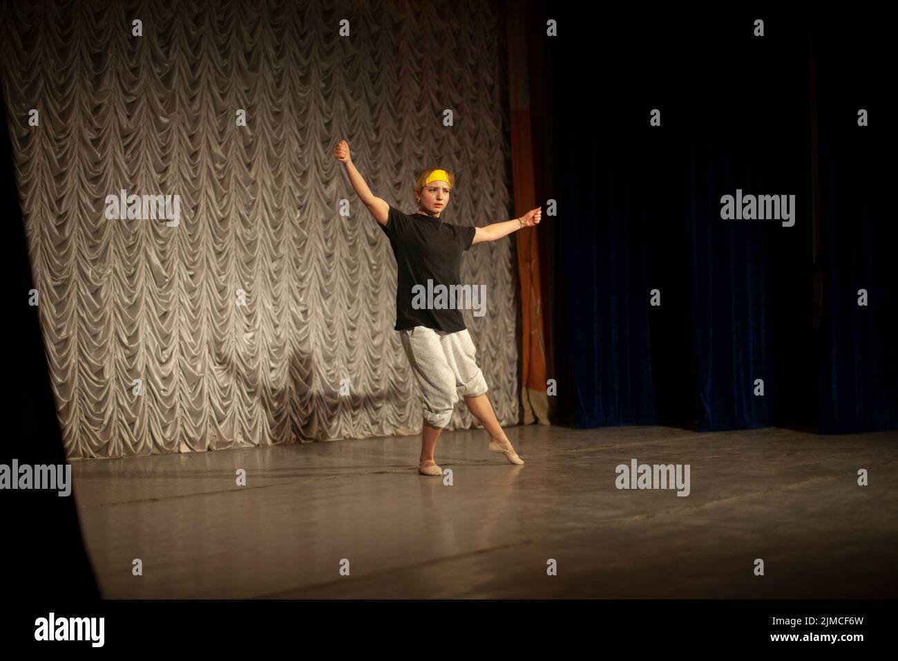 Dancer on stage. Ballet teacher. Expression of emotions in motion ...