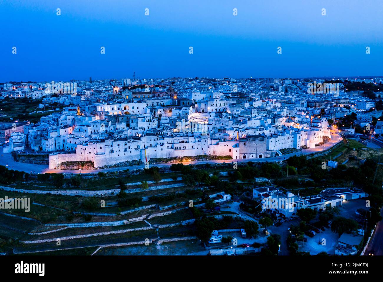 Aerial view at dusk, Mountain village, Ostuni, Apulia, Southern Italy ...