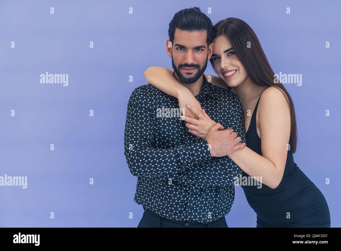 Woman wrapping arms around husband hi-res stock photography and images ...