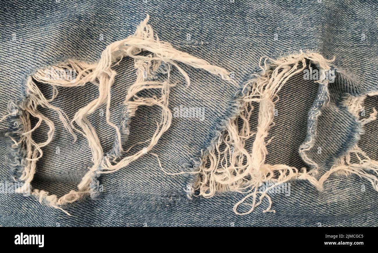 Ripped denim texture hi-res stock photography and images - Alamy