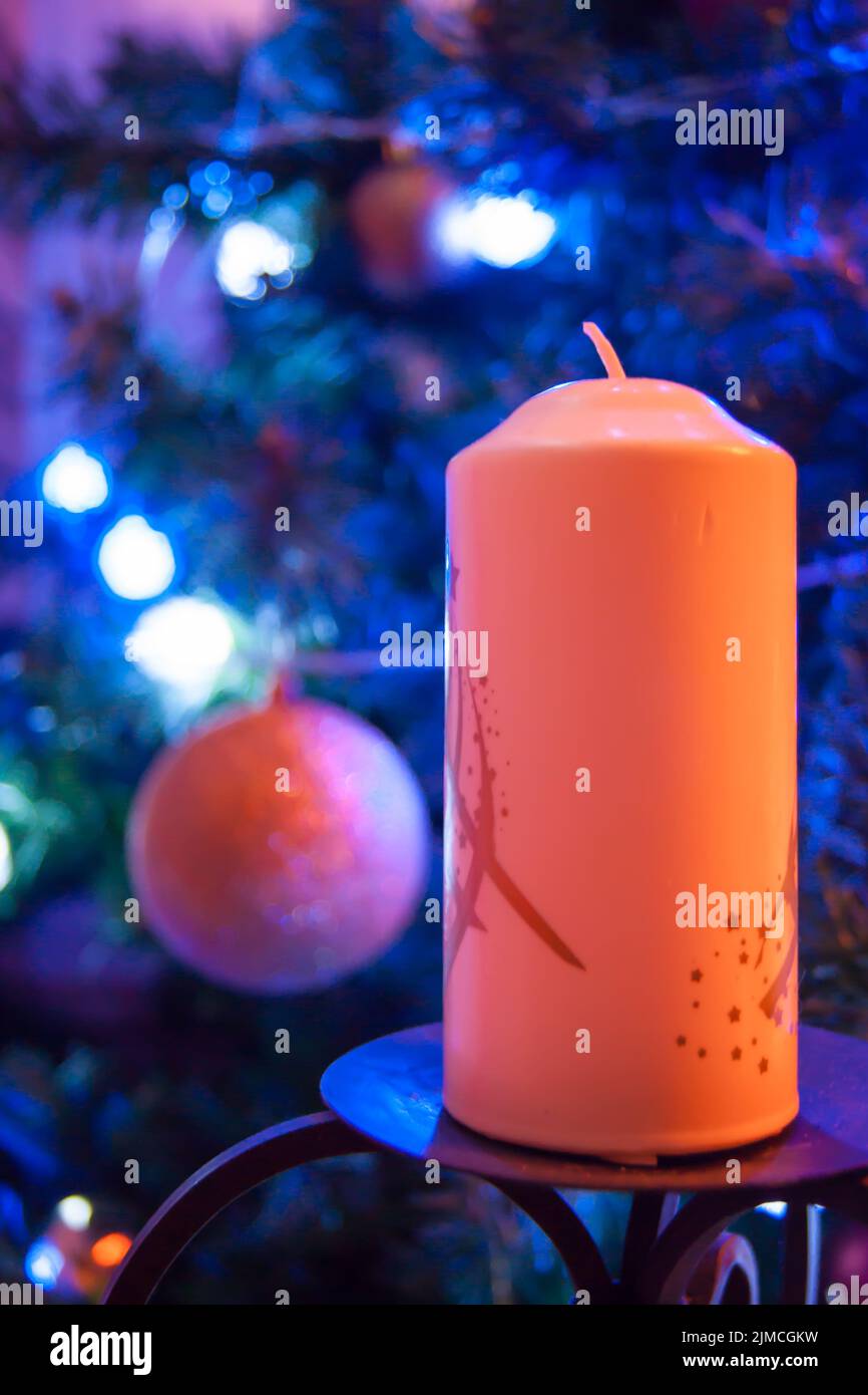 Decorated New Year or Christmas tree in the interior. Artificial ...