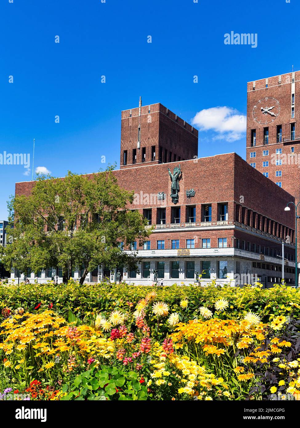 Monumental red brick city hall with two towers, architects Arnstein ...