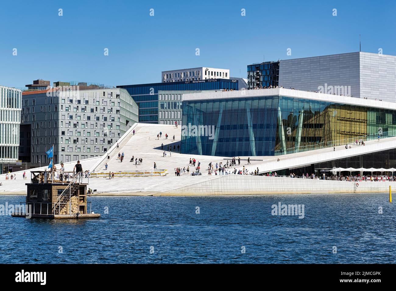 Sauna boat, floating sauna in front of the opera house in summer ...