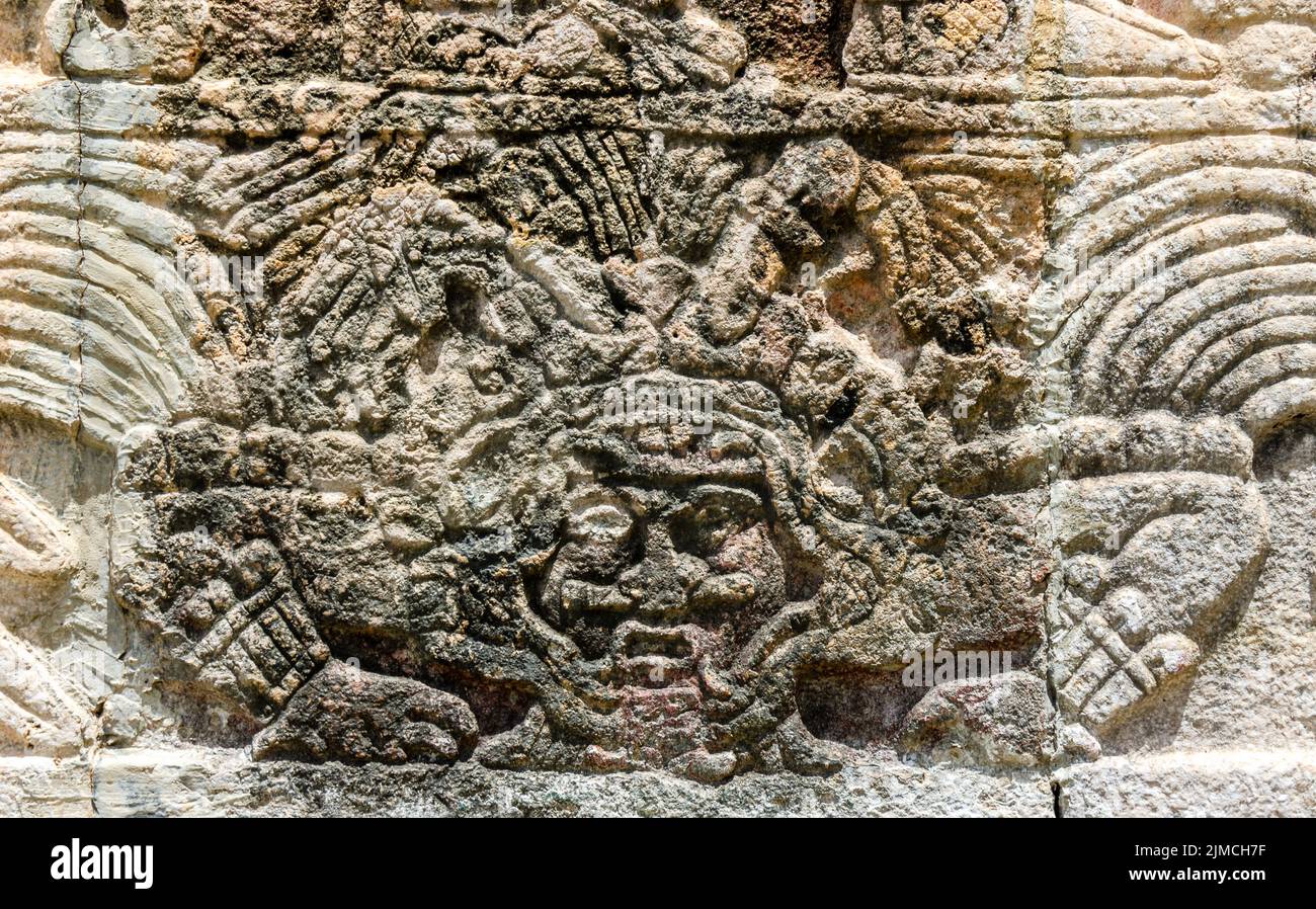 Mayan carving of a face in Chichen Itza, Mexico Stock Photo - Alamy