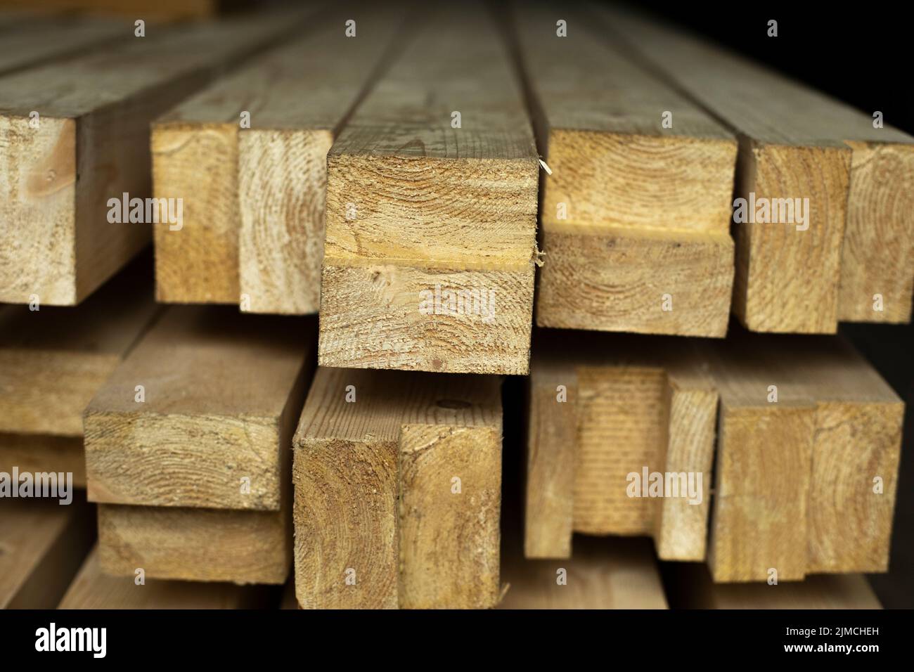 Sawn boards. Building material. Details of pruned wood. Joists lie in ...